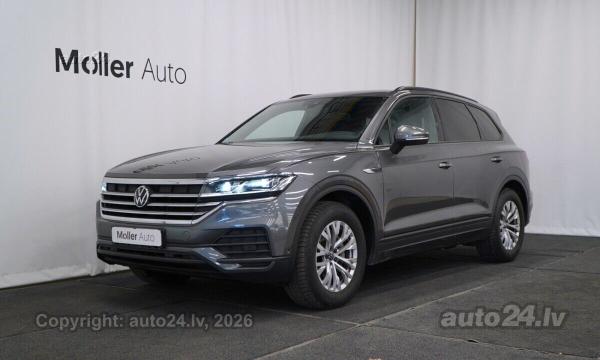 Grey Volkswagen Touareg 2023 in Tallinn, with an engine capacity of 3.00 L and mileage of 100 thousand km for 45900 €, photo 1 on AUTOMOTO.COM.LV