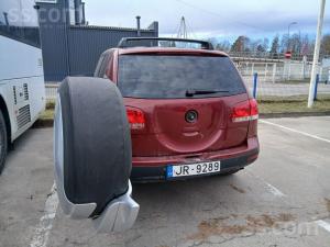 Sarkans Volkswagen Touareg 2005 Rīga, ar dzinēja tilpumu 2.50 L un nobraukumu 335 tūkst. km par 2855 €, foto 4 vietnē AUTOMOTO.COM.LV