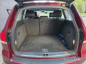 Red Volkswagen Touareg 2005 in Riga, with an engine capacity of 2.50 L and mileage of 270 thousand km for 2200 €, photo 17 on AUTOMOTO.COM.LV