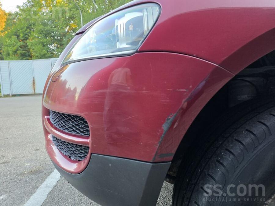 Red Volkswagen Touareg 2005 in Riga, with an engine capacity of 2.50 L and mileage of 270 thousand km for 2200 €, photo 23 on AUTOMOTO.COM.LV