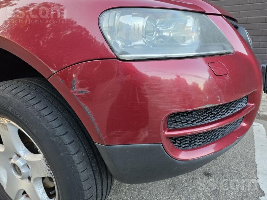 Red Volkswagen Touareg 2005 in Riga, with an engine capacity of 2.50 L and mileage of 270 thousand km for 2200 €, photo 24 on AUTOMOTO.COM.LV