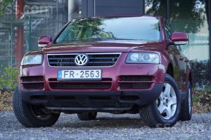 Sarkans Volkswagen Touareg 2005 Rīga, ar dzinēja tilpumu 2.50 L un nobraukumu 268 tūkst. km par 2490 €, foto 3 vietnē AUTOMOTO.COM.LV