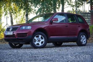 Sarkans Volkswagen Touareg 2005 Rīga, ar dzinēja tilpumu 2.50 L un nobraukumu 268 tūkst. km par 2490 €, foto 4 vietnē AUTOMOTO.COM.LV