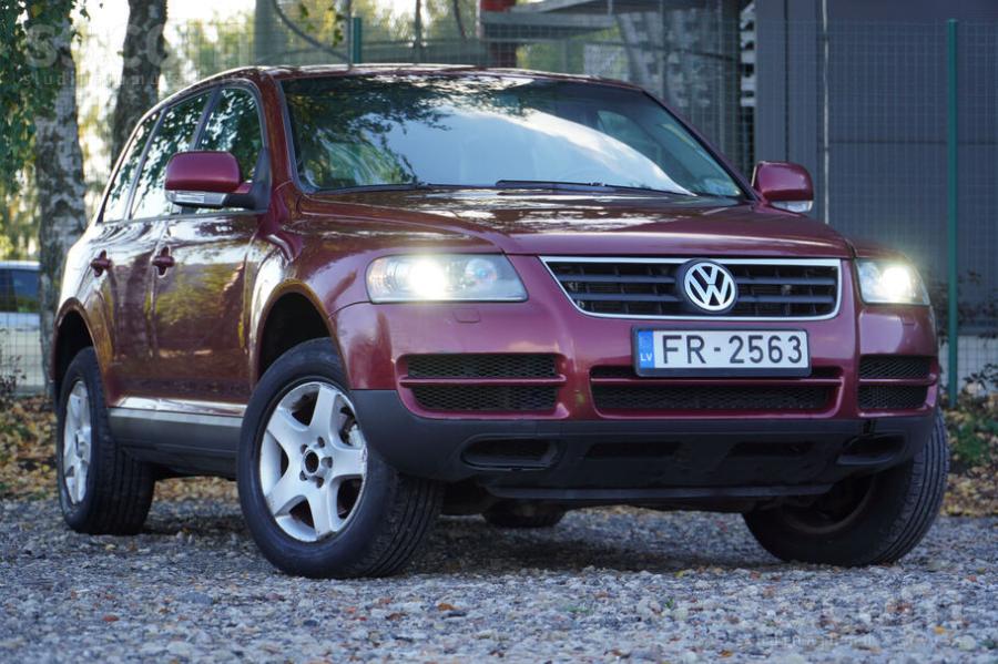 Sarkans Volkswagen Touareg 2005 Rīga, ar dzinēja tilpumu 2.50 L un nobraukumu 268 tūkst. km par 2490 €, foto 5 vietnē AUTOMOTO.COM.LV