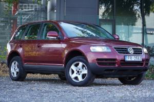 Sarkans Volkswagen Touareg 2005 Rīga, ar dzinēja tilpumu 2.50 L un nobraukumu 268 tūkst. km par 2490 €, foto 6 vietnē AUTOMOTO.COM.LV