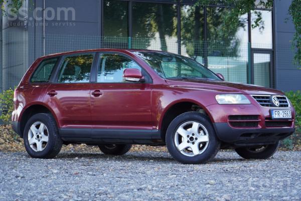 Sarkans Volkswagen Touareg 2005 Rīga, ar dzinēja tilpumu 2.50 L un nobraukumu 268 tūkst. km par 2490 €, foto 7 vietnē AUTOMOTO.COM.LV