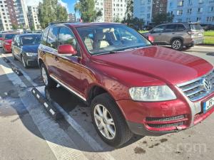 Red Volkswagen Touareg 2005 in Riga, with an engine capacity of 2.50 L and mileage of 0 thousand km for 2200 €, photo  on AUTOMOTO.COM.LV