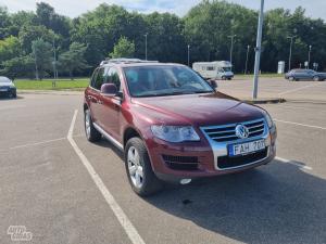 Red Volkswagen Touareg 2007 in Klaipeda, with an engine capacity of 2.50 L and mileage of 219 thousand km for 3700 €, photo  on AUTOMOTO.COM.LV