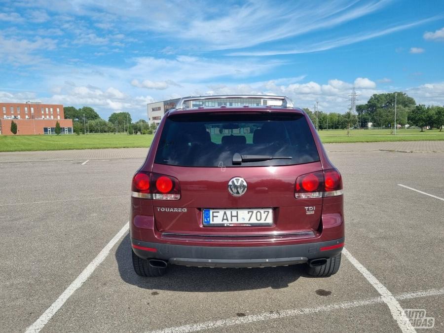 Red Volkswagen Touareg 2007 in Klaipeda, with an engine capacity of 2.50 L and mileage of 219 thousand km for 3700 €, photo 6 on AUTOMOTO.COM.LV