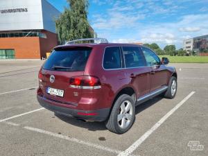 Red Volkswagen Touareg 2007 in Klaipeda, with an engine capacity of 2.50 L and mileage of 219 thousand km for 3700 €, photo 7 on AUTOMOTO.COM.LV