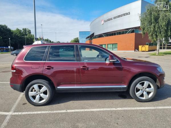 Red Volkswagen Touareg 2007 in Klaipeda, with an engine capacity of 2.50 L and mileage of 219 thousand km for 3700 €, photo 7 on AUTOMOTO.COM.LV