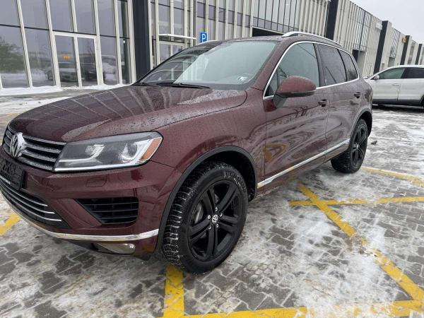 Sarkans Volkswagen Touareg 2017 Viļņa, ar dzinēja tilpumu 3.60 L un nobraukumu 309 tūkst. km par 12900 €, foto 2 vietnē AUTOMOTO.COM.LV