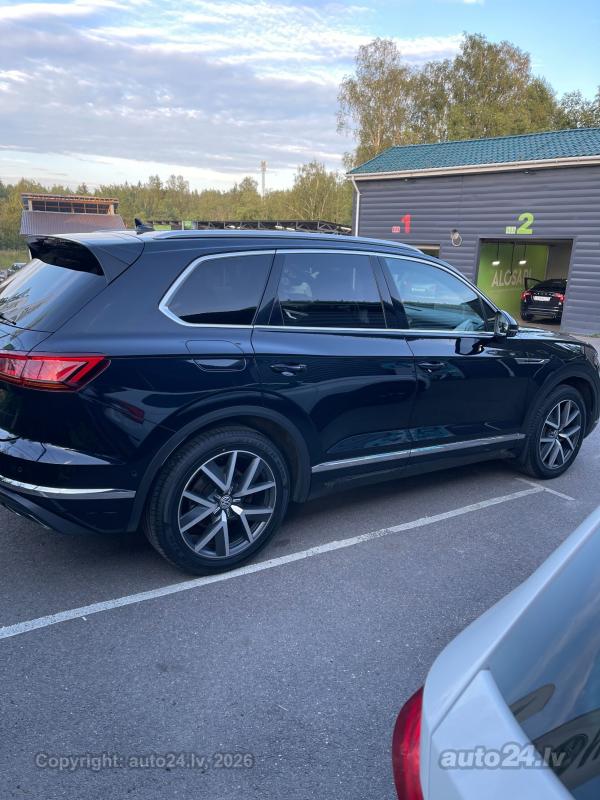 Violets Volkswagen Touareg 2019 Tallina, ar dzinēja tilpumu 3.00 L un nobraukumu 180 tūkst. km par 36700 €, foto 6 vietnē AUTOMOTO.COM.LV