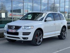White Volkswagen Touareg 2007 in Rezekne, with an engine capacity of 3.00 L and mileage of 349 thousand km for 5995 €, photo 3 on AUTOMOTO.COM.LV