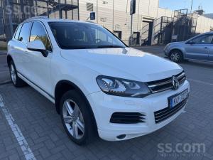 White Volkswagen Touareg 2010 in Riga, with an engine capacity of 3.00 L and mileage of 228 thousand km for 12700 €, photo  on AUTOMOTO.COM.LV