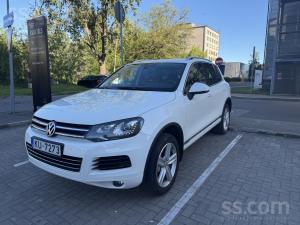 White Volkswagen Touareg 2010 in Riga, with an engine capacity of 3.00 L and mileage of 230 thousand km for 11300 €, photo  on AUTOMOTO.COM.LV