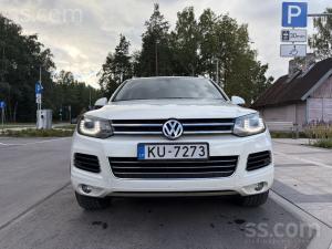 White Volkswagen Touareg 2010 in Riga, with an engine capacity of 3.00 L and mileage of 231 thousand km for 10800 €, photo  on AUTOMOTO.COM.LV