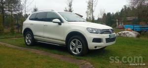 White Volkswagen Touareg 2010 in Daugavpils, with an engine capacity of 3.00 L and mileage of 312 thousand km for 9950 €, photo  on AUTOMOTO.COM.LV