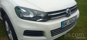 White Volkswagen Touareg 2010 in Daugavpils, with an engine capacity of 3.00 L and mileage of 312 thousand km for 9950 €, photo 3 on AUTOMOTO.COM.LV