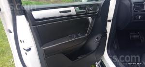 White Volkswagen Touareg 2010 in Daugavpils, with an engine capacity of 3.00 L and mileage of 312 thousand km for 9950 €, photo 22 on AUTOMOTO.COM.LV