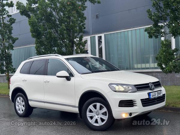 White Volkswagen Touareg 2011 in Tallinn, with an engine capacity of 3.00 L and mileage of 269 thousand km for 9350 €, photo 2 on AUTOMOTO.COM.LV