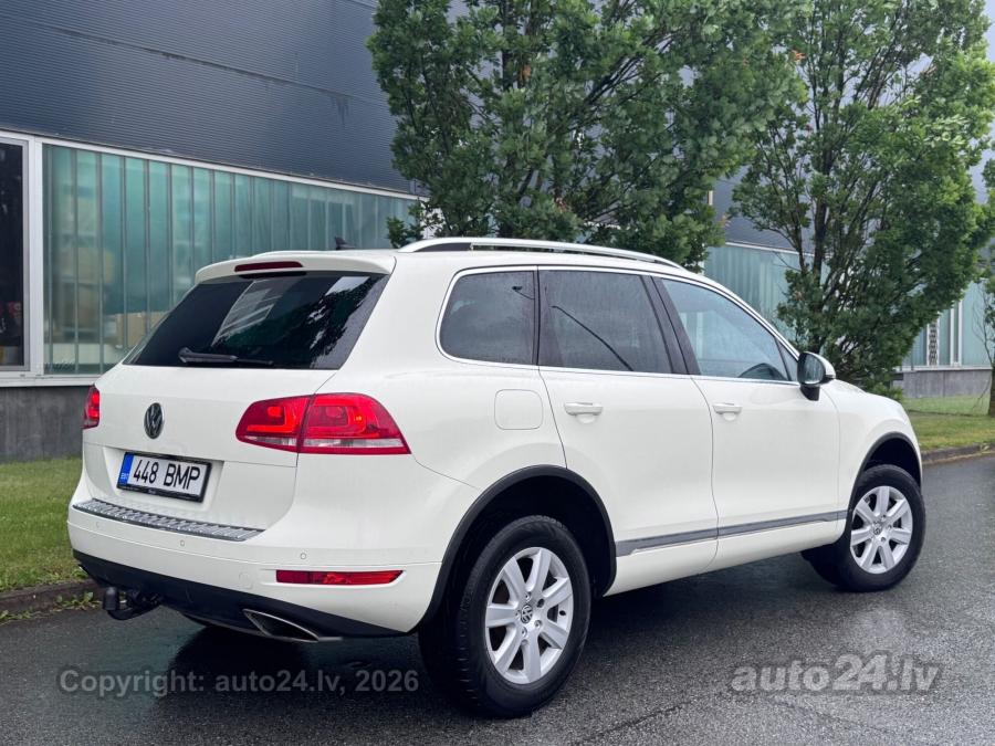 Balts Volkswagen Touareg 2011 Tallina, ar dzinēja tilpumu 3.00 L un nobraukumu 269 tūkst. km par 9350 €, foto 4 vietnē AUTOMOTO.COM.LV