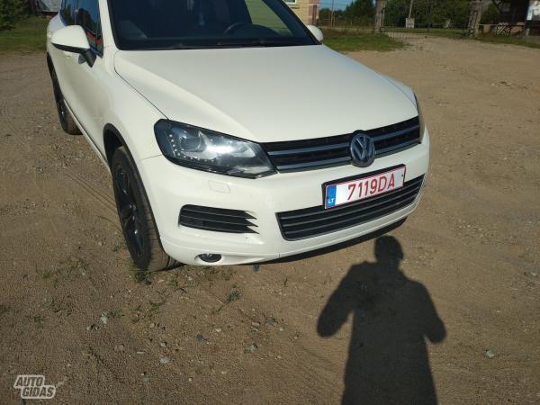 Balts Volkswagen Touareg 2011 Utena, ar dzinēja tilpumu 3.00 L un nobraukumu 206 tūkst. km par 9000 €, foto 1 vietnē AUTOMOTO.COM.LV