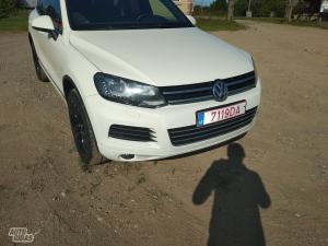 White Volkswagen Touareg 2011 in Utena, with an engine capacity of 3.00 L and mileage of 206 thousand km for 9000 €, photo  on AUTOMOTO.COM.LV