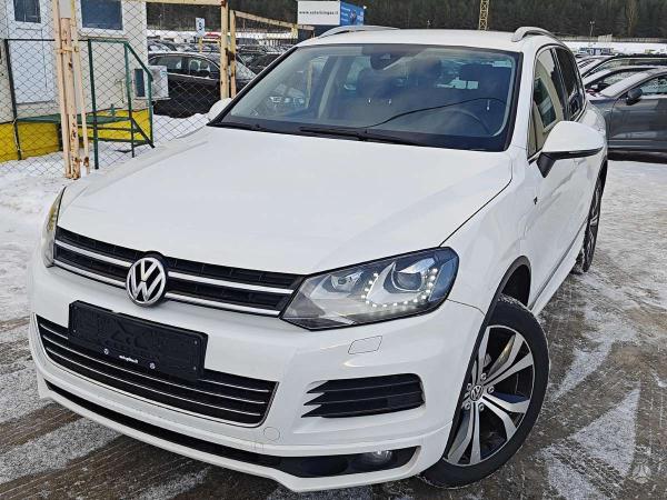 White Volkswagen Touareg 2012 in Vilnius, with an engine capacity of 2.97 L and mileage of 269 thousand km for 13400 €, photo 11 on AUTOMOTO.COM.LV