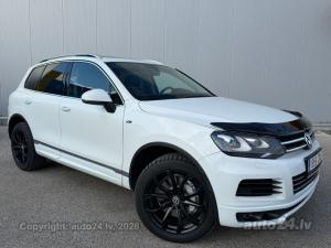 White Volkswagen Touareg 2012 in Tartu, with an engine capacity of 4.10 L and mileage of 280 thousand km for 14900 €, photo 3 on AUTOMOTO.COM.LV