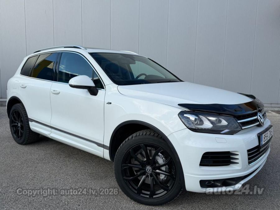White Volkswagen Touareg 2012 in Tartu, with an engine capacity of 4.10 L and mileage of 280 thousand km for 14900 €, photo 3 on AUTOMOTO.COM.LV