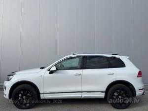 White Volkswagen Touareg 2012 in Tartu, with an engine capacity of 4.10 L and mileage of 280 thousand km for 14900 €, photo 4 on AUTOMOTO.COM.LV