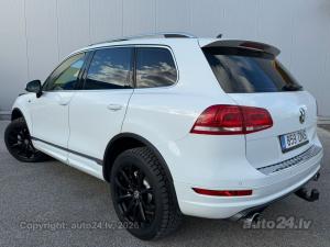White Volkswagen Touareg 2012 in Tartu, with an engine capacity of 4.10 L and mileage of 280 thousand km for 14900 €, photo 5 on AUTOMOTO.COM.LV