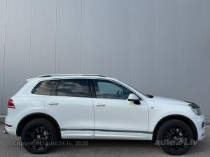 White Volkswagen Touareg 2012 in Tartu, with an engine capacity of 4.10 L and mileage of 280 thousand km for 14900 €, photo 6 on AUTOMOTO.COM.LV