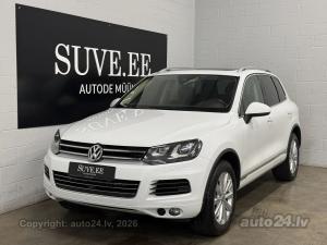 White Volkswagen Touareg 2012 in Tallinn, with an engine capacity of 3.00 L and mileage of 255 thousand km for 11995 €, photo  on AUTOMOTO.COM.LV
