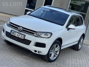 White Volkswagen Touareg 2012 in Jurmala, with an engine capacity of 4.20 L and mileage of 0 thousand km for 9990 €, photo  on AUTOMOTO.COM.LV