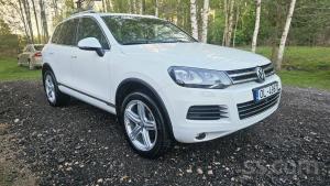 White Volkswagen Touareg 2013 in Riga, with an engine capacity of 3.00 L and mileage of 0 thousand km for 8998 €, photo  on AUTOMOTO.COM.LV