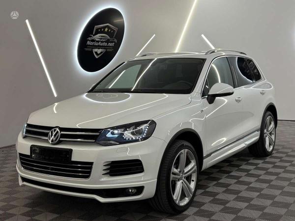 White Volkswagen Touareg 2013 in Marijampole, with an engine capacity of 2.97 L and mileage of 317 thousand km for 13450 €, photo 9 on AUTOMOTO.COM.LV