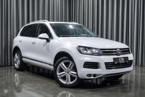 White Volkswagen Touareg 2014 in Marijampole, with an engine capacity of 2.97 L and mileage of 237 thousand km for 14450 €, photo  on AUTOMOTO.COM.LV