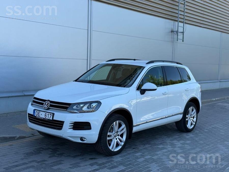 White Volkswagen Touareg 2014 in Riga, with an engine capacity of 3.00 L and mileage of 0 thousand km for 11900 €, photo 1 on AUTOMOTO.COM.LV