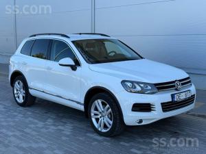 White Volkswagen Touareg 2014 in Riga, with an engine capacity of 3.00 L and mileage of 0 thousand km for 11900 €, photo 2 on AUTOMOTO.COM.LV