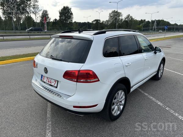 Volkswagen Touareg 2014 Rīga vietnē Balts Volkswagen Touareg 2014 Rīga, ar dzinēja tilpumu 3.00 L un nobraukumu 277 tūkst. km par 9700 €, foto 8 vietnē AUTOMOTO.COM.LV