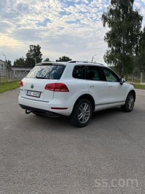 Balts Volkswagen Touareg 2014 Rīga, ar dzinēja tilpumu 3.00 L un nobraukumu 336 tūkst. km par 11000 €, foto 4 vietnē AUTOMOTO.COM.LV