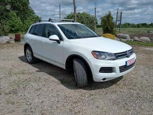 White Volkswagen Touareg 2014 in Silute, with an engine capacity of 2.97 L and mileage of 278 thousand km for 12995 €, photo  on AUTOMOTO.COM.LV