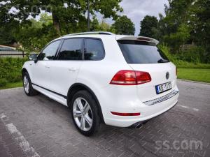 Balts Volkswagen Touareg 2014 Rīga, ar dzinēja tilpumu 3.00 L un nobraukumu 276 tūkst. km par 17000 €, foto 7 vietnē AUTOMOTO.COM.LV