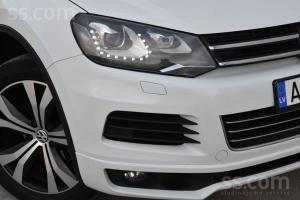 Balts Volkswagen Touareg 2014 Rīga, ar dzinēja tilpumu 3.00 L un nobraukumu 242 tūkst. km par 15750 €, foto 32 vietnē AUTOMOTO.COM.LV