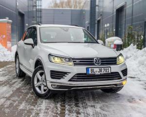 White Volkswagen Touareg 2015 in Klaipeda, with an engine capacity of 2.97 L and mileage of 292 thousand km for 14950 €, photo  on AUTOMOTO.COM.LV