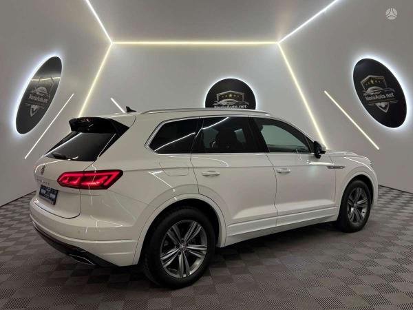 Фольксваген Туарег 2019 в Мариямполе на AUTOMOTO.COM.LV Белый Фольксваген Туарег 2019 в Мариямполе, объемом двигателя 2.97 л и пробегом 94 тыс. км за 39999 €, фото 8 на AUTOMOTO.COM.LV