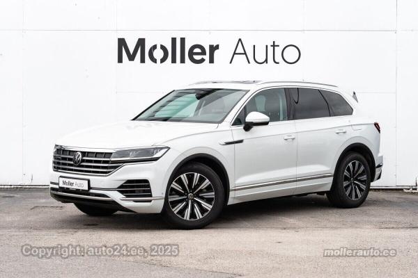 White Volkswagen Touareg 2021 in Riga, with an engine capacity of 3.00 L and mileage of 82 thousand km for 43810 €, photo 1 on AUTOMOTO.COM.LV