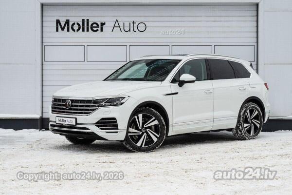 White Volkswagen Touareg 2021 in Riga, with an engine capacity of 3.00 L and mileage of 96 thousand km for 44578 €, photo 1 on AUTOMOTO.COM.LV